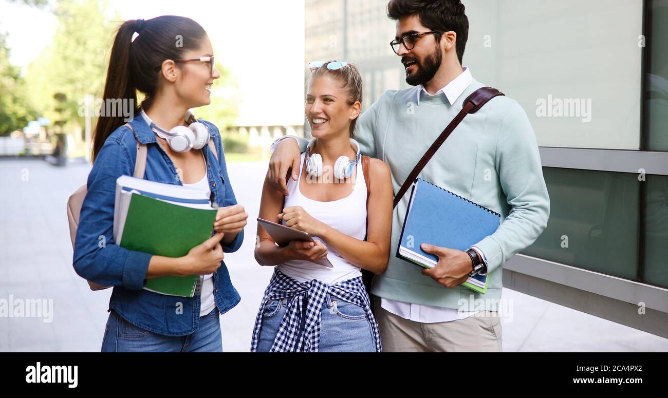 College students studying on university campus outdoor Stock Photo - Alamy
