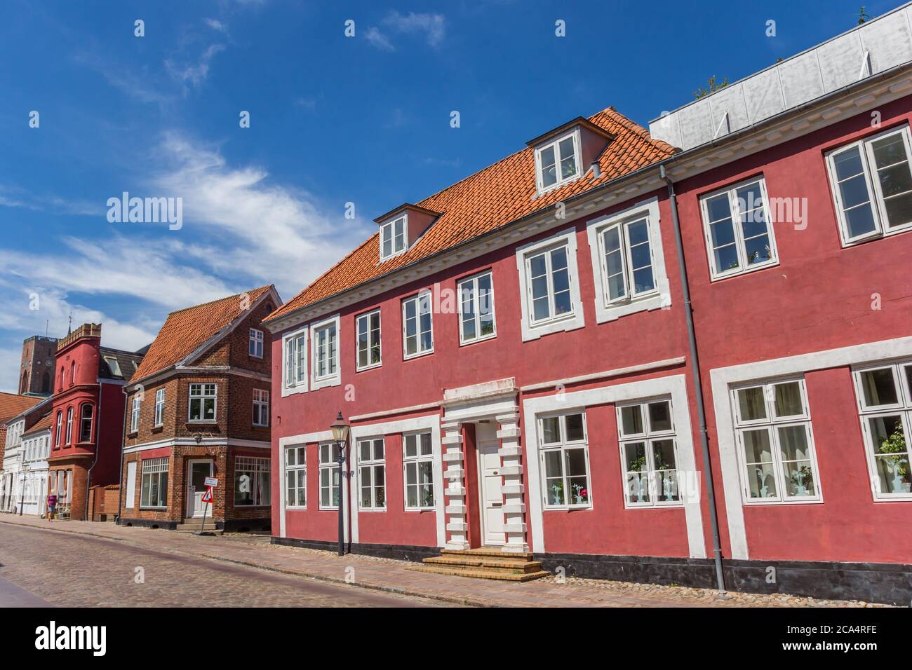 Colorful red facades in the streets of Ribe, Denmark Stock Photo - Alamy