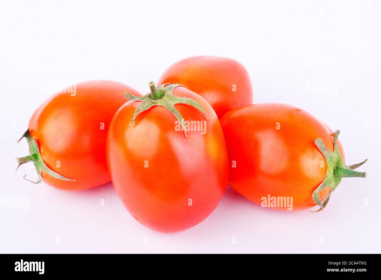 Red tomato is a vegetable, that is healthy on the white background ...