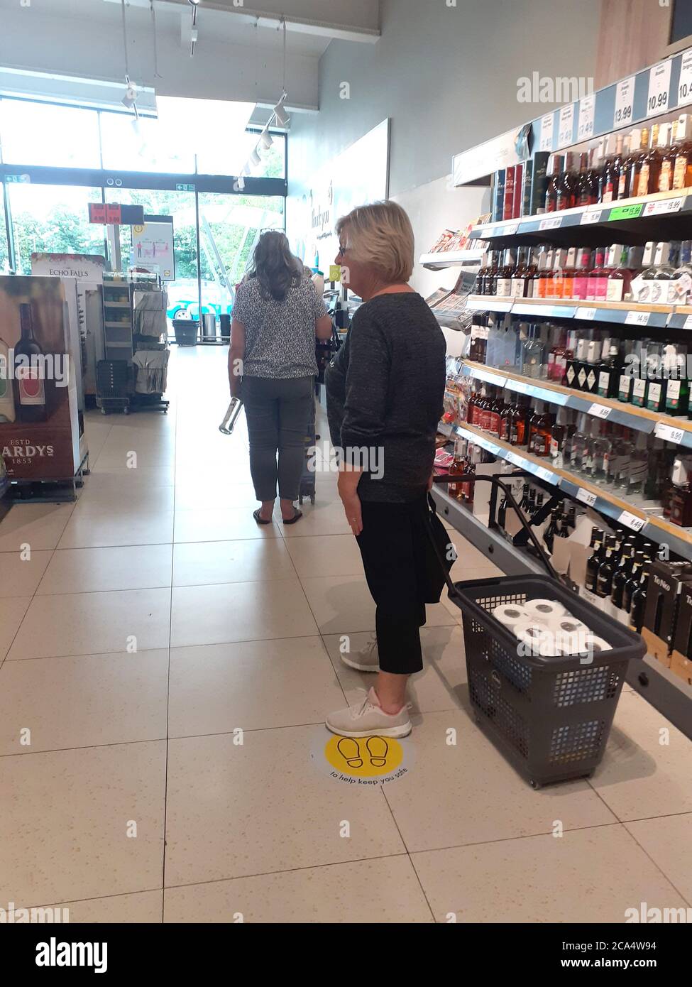 queue in shop during pandemic Covid 19 Coronavirus Social Distancing ...