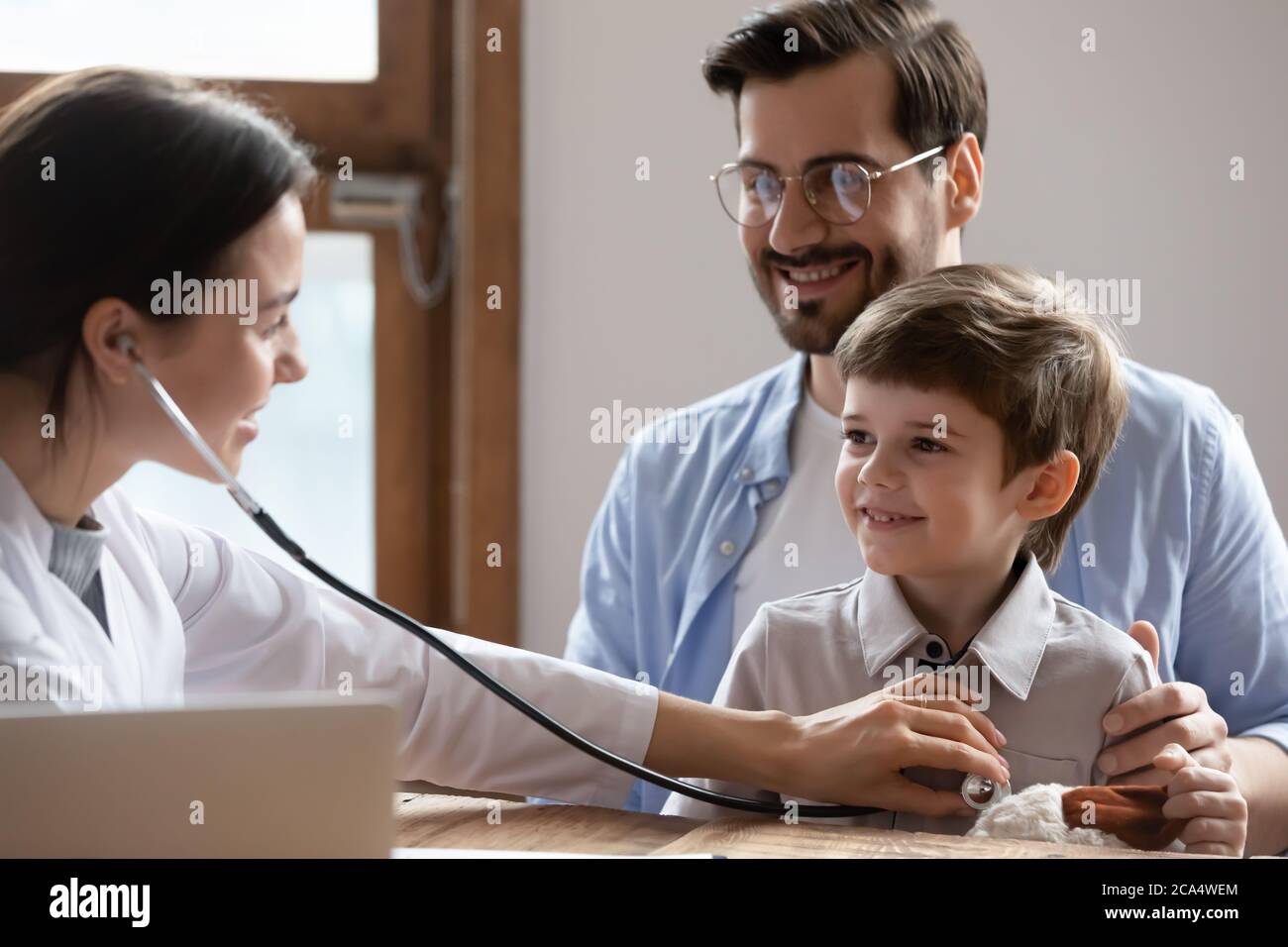 Happy daddy meeting family therapist with small kid son Stock Photo - Alamy