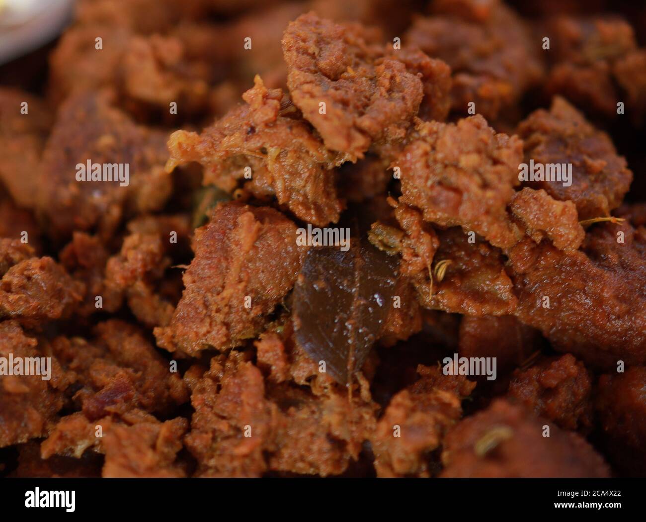 South Indian dish spicy beef fry Kerala, India. side dish ghee rice ...