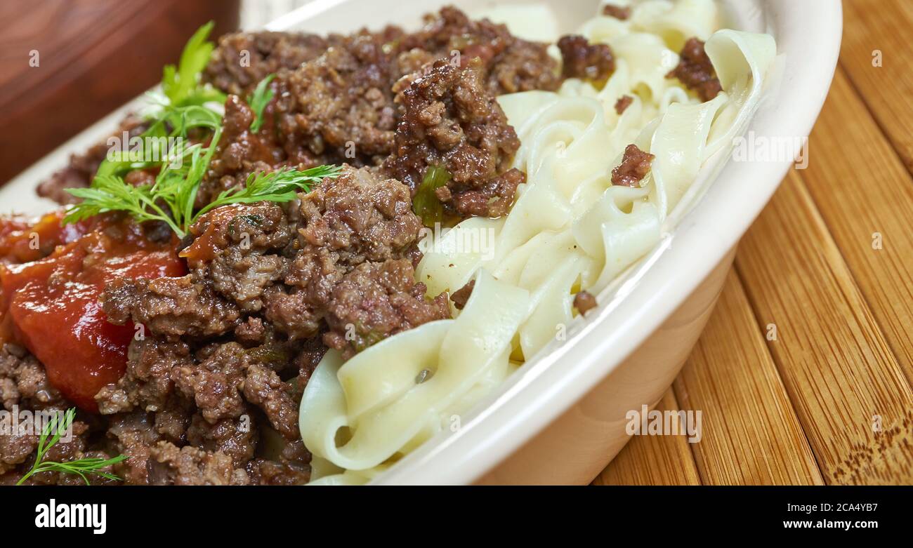 Rich ragu - Classic Italian beef ragu with shredded beef Stock Photo ...
