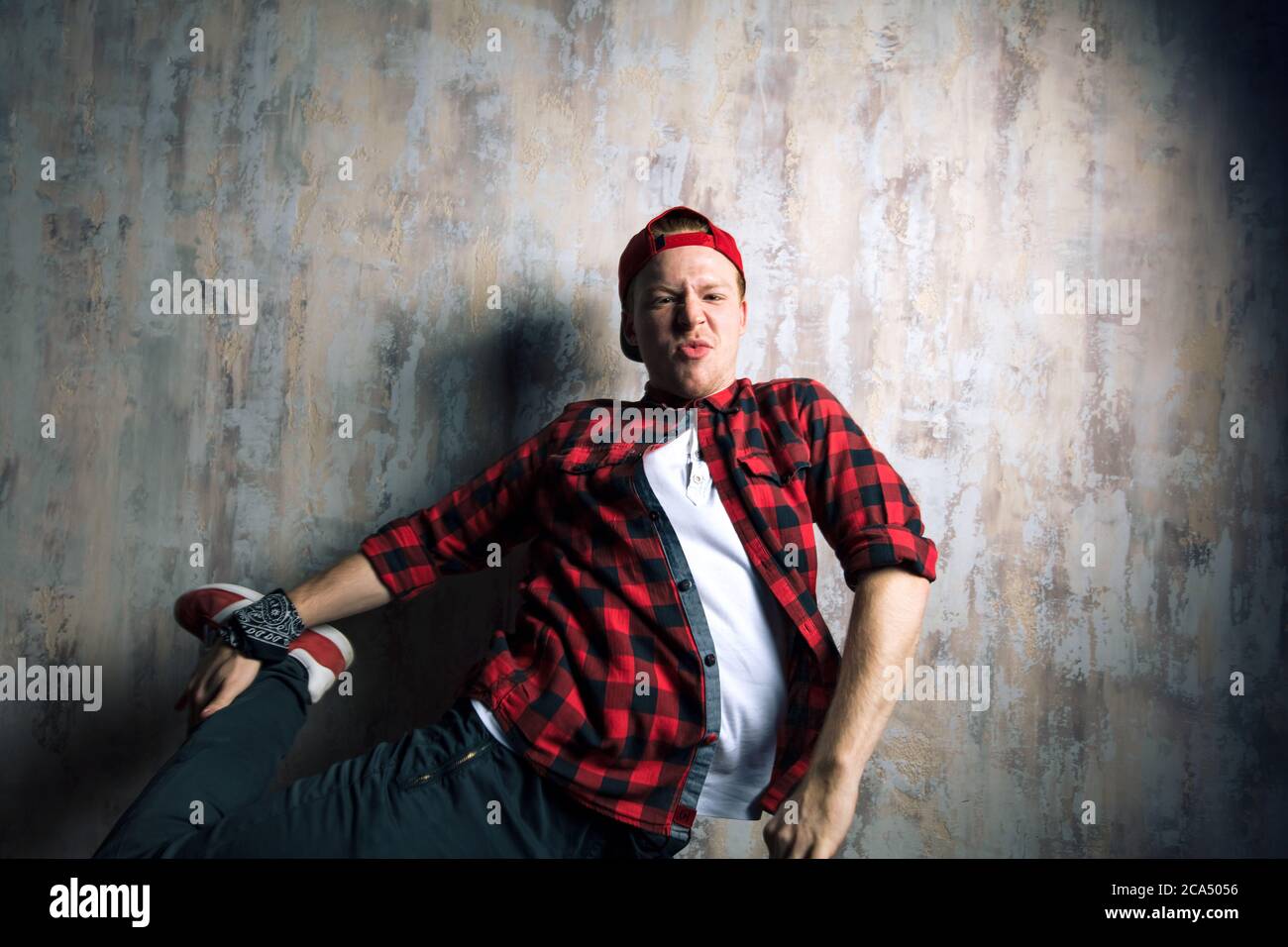 serious guy concentrated on his dancing. man is bad at dancing. guy ...