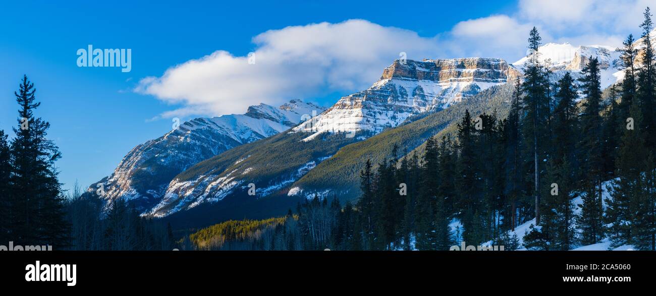 View of mountains against blue sky, Jasper National Park, Alberta ...