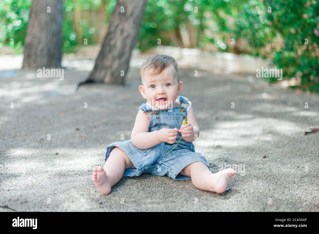 Baby playing alone hi-res stock photography and images - Alamy