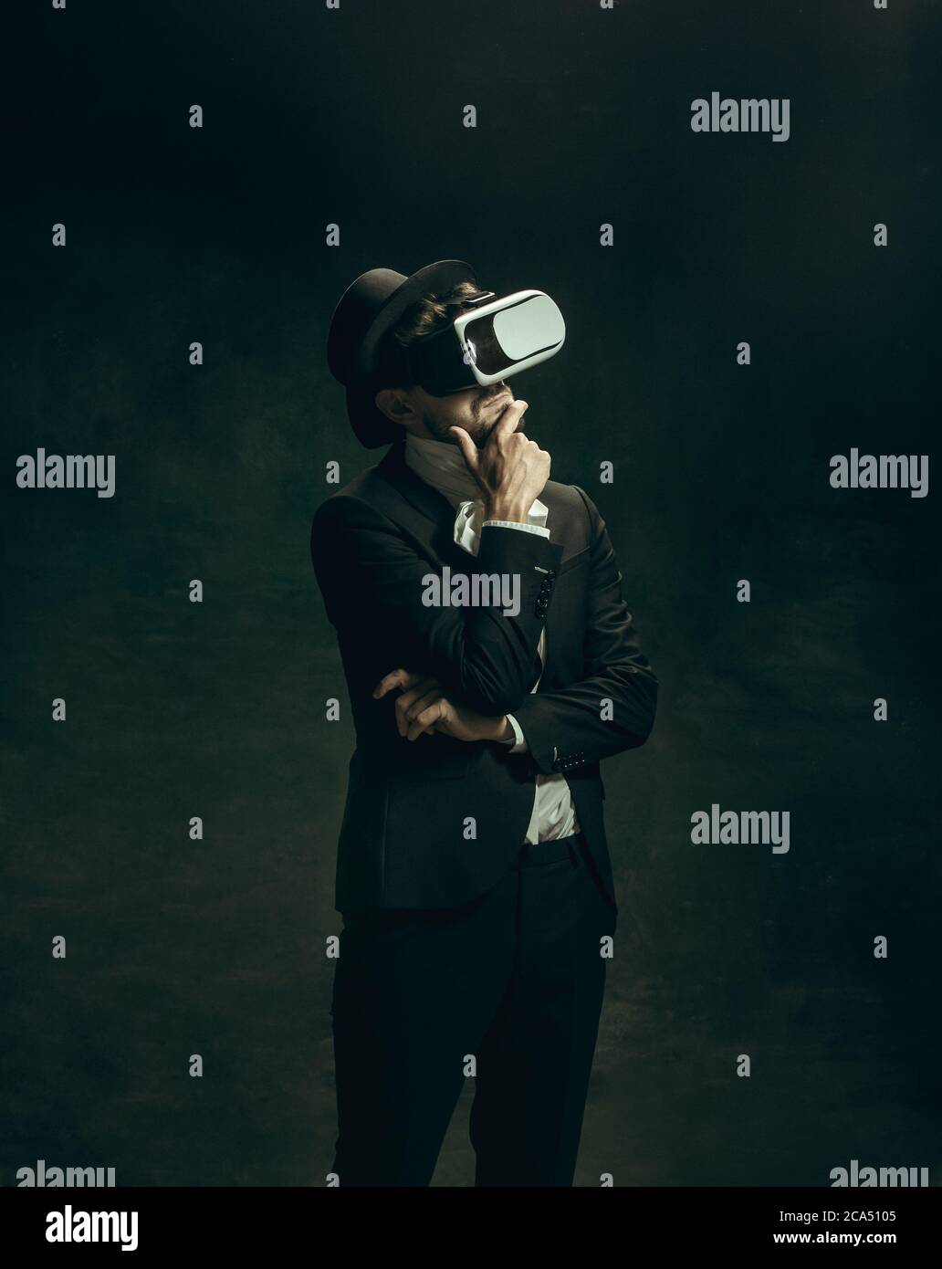 His virtual world forever young. Young man in suit as Dorian Gray ...