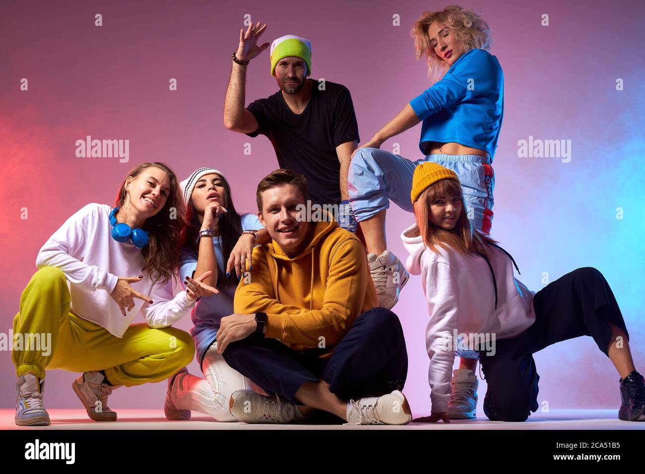 Avtive break dancers showing different cheerful emotions, happy to get ...