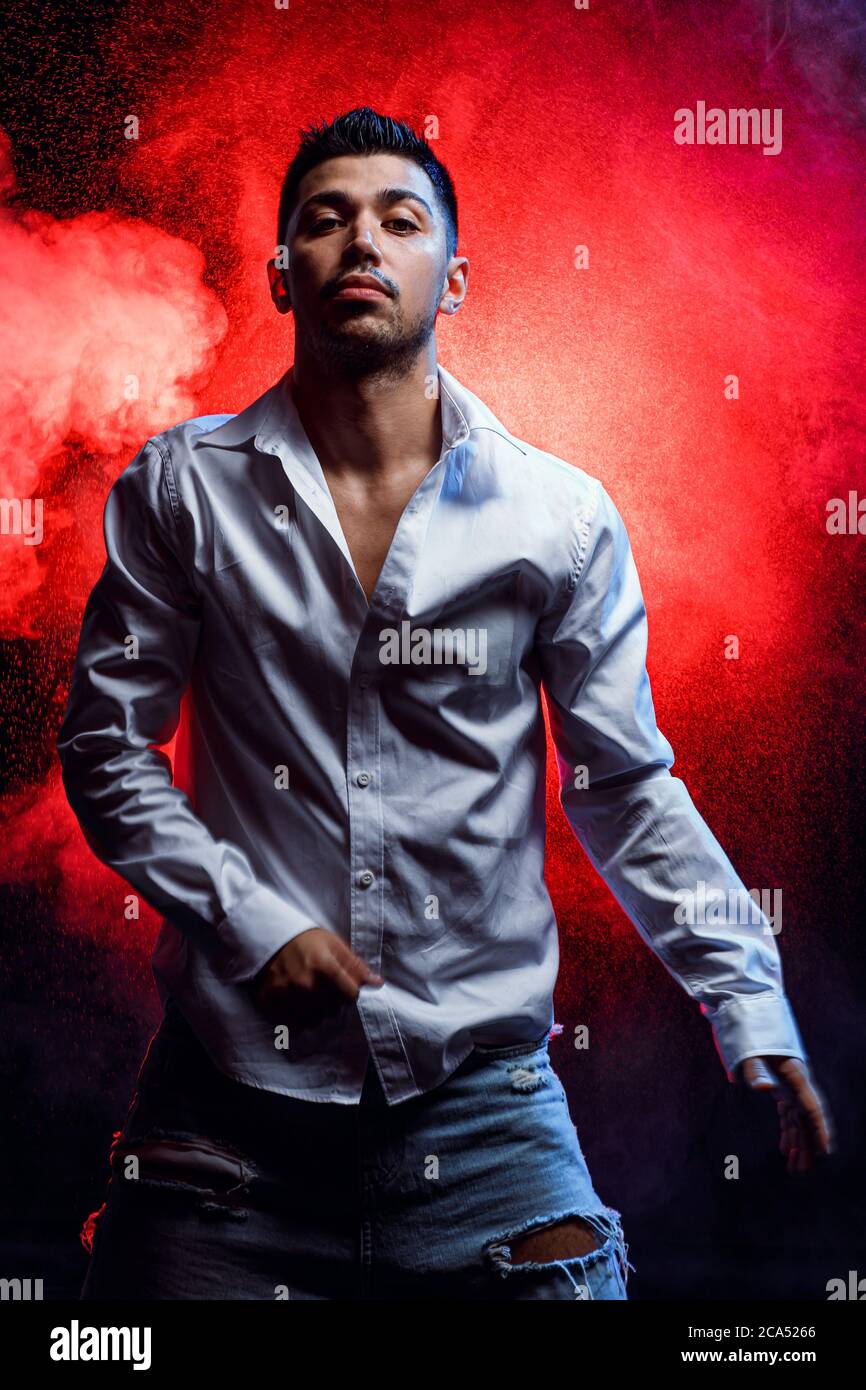 Young man professional dancer fond of dancing. dancing movements by ...