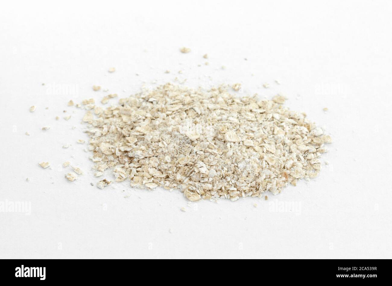 Pile of Dry oatmeal isolated on white background Stock Photo - Alamy