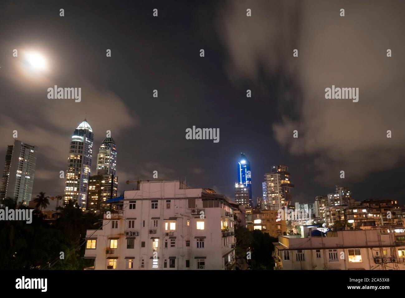 MOONRISE IN MUMBAI OVER THE IMPERIAL TOWERS WITH BEAUTIFUL COLOURS IN ...
