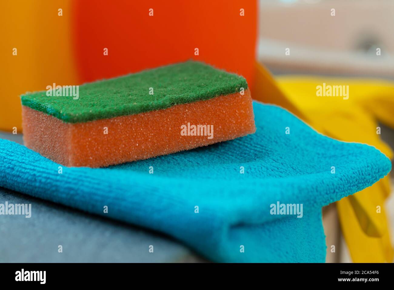 Cleaning sponge and rag on kitchen counter Stock Photo - Alamy