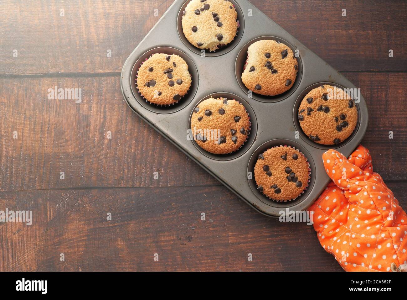 Top view of women hand holding chocolate pan cake Stock Photo - Alamy