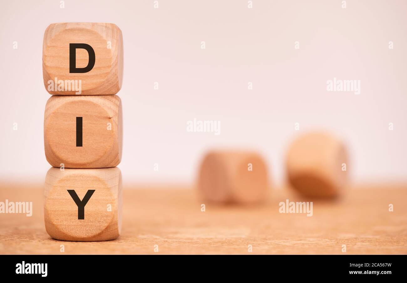 do it yourself DIY printed on wooden cubes Stock Photo - Alamy