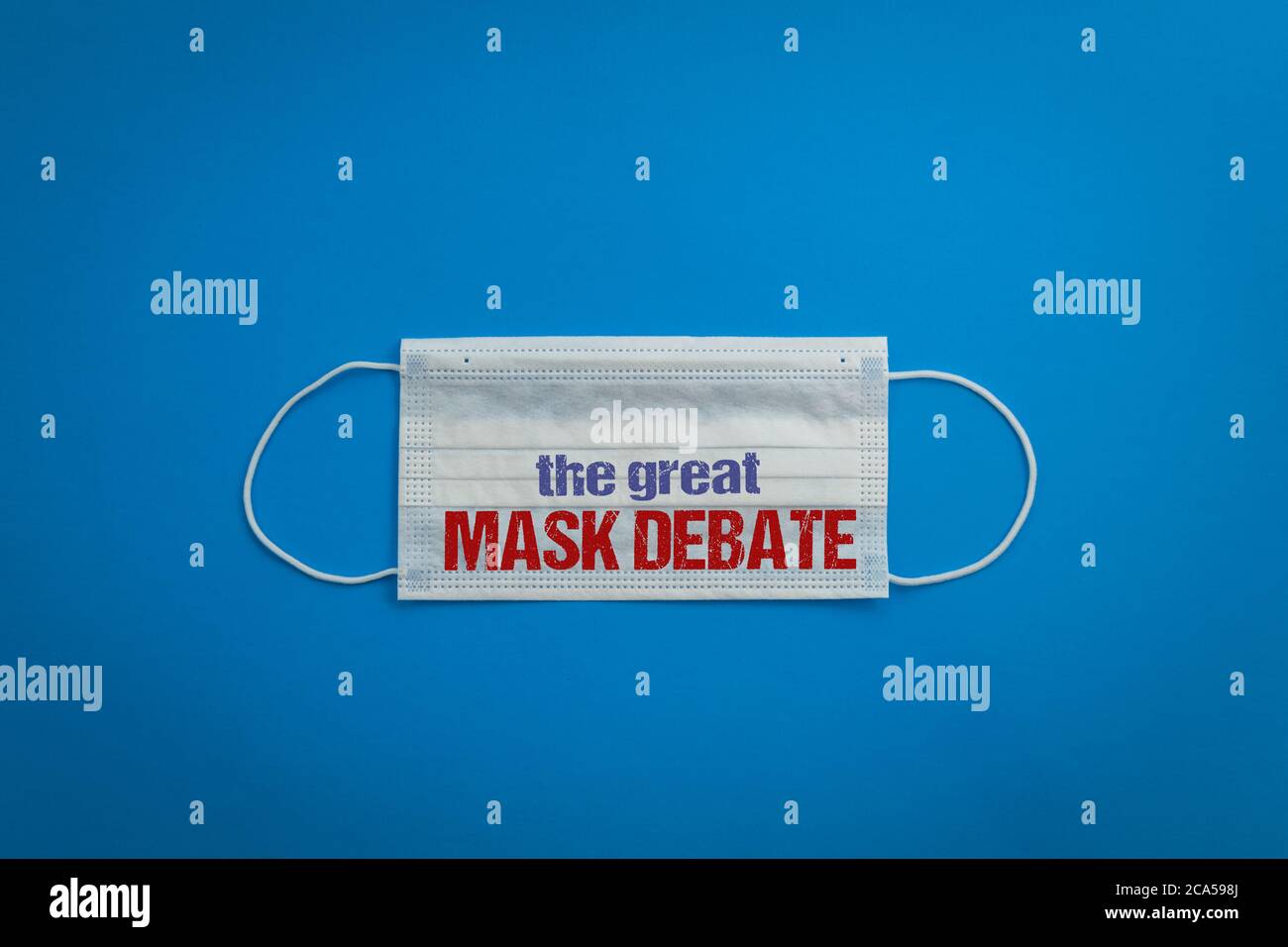 Mask on blue background the great MASK DEBATE red text copy space ...