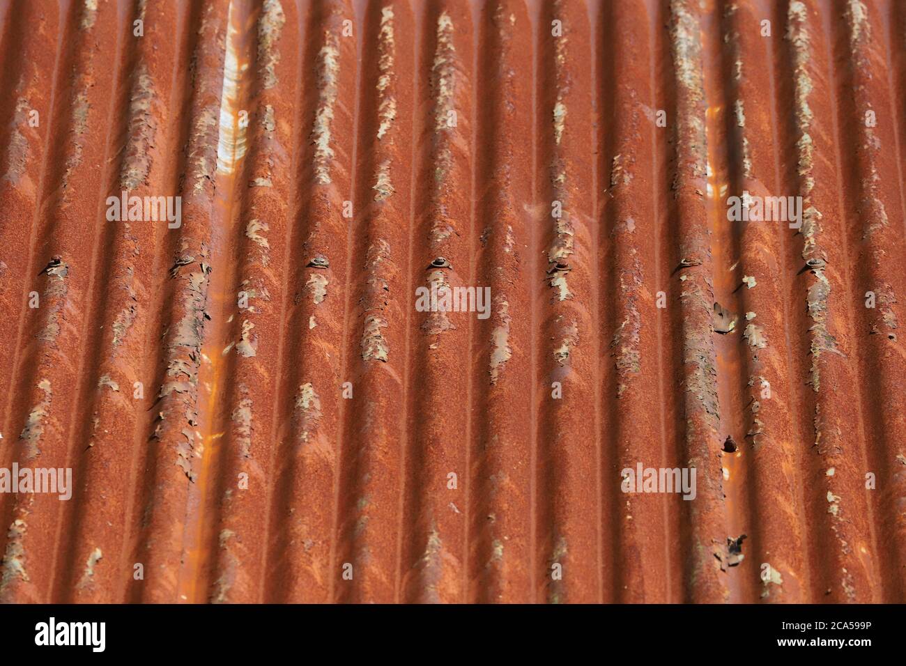Rusty corrugated iron metal roof Stock Photo - Alamy