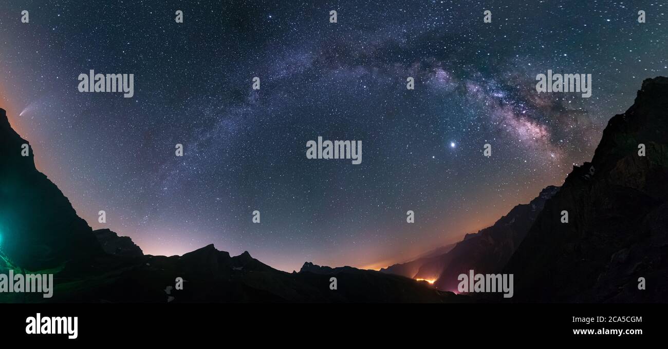 Milky Way arc and stars in night sky over the Alps. Outstanding Comet ...