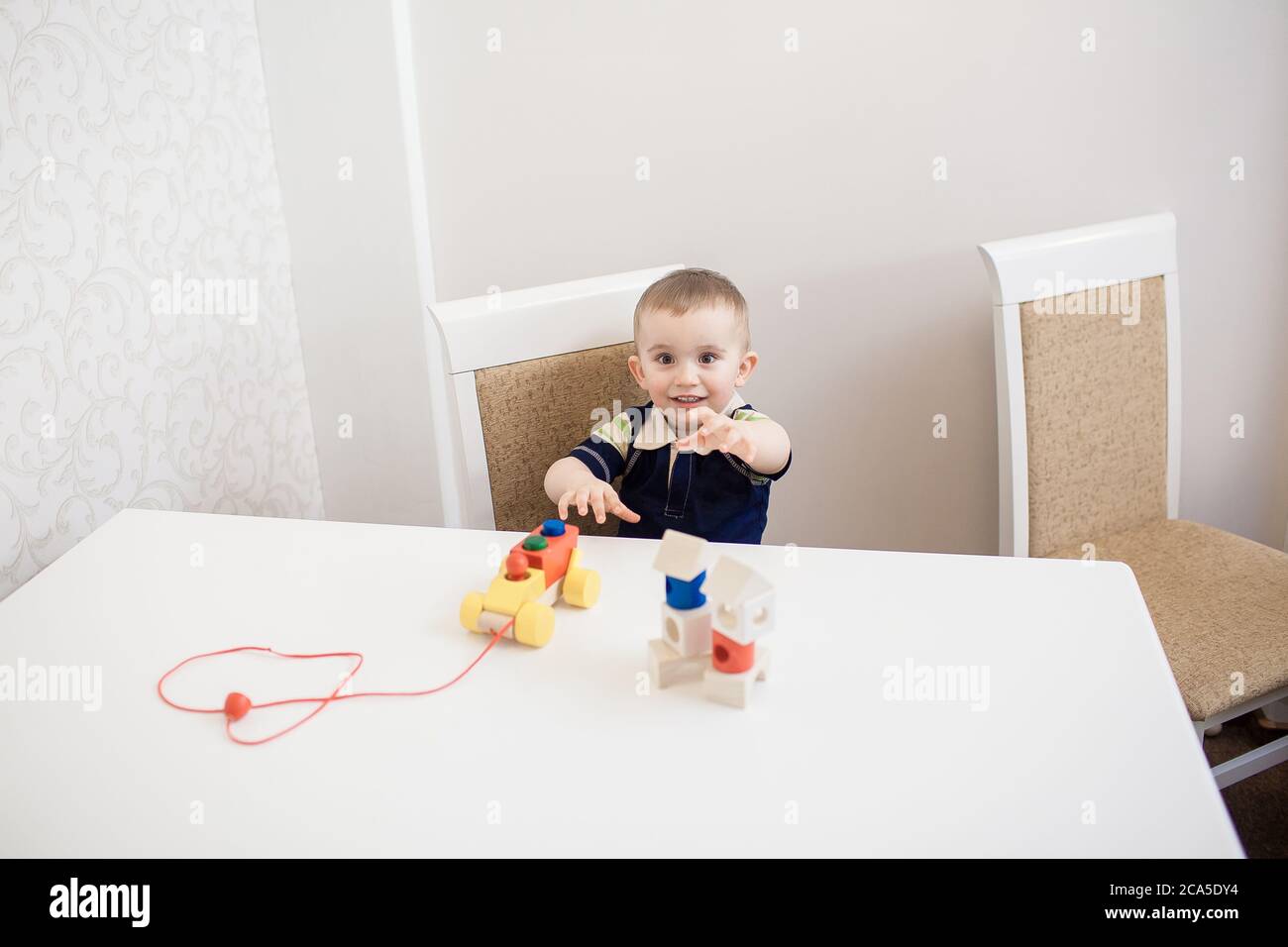 Cute baby boy with blocks Stock Photo - Alamy