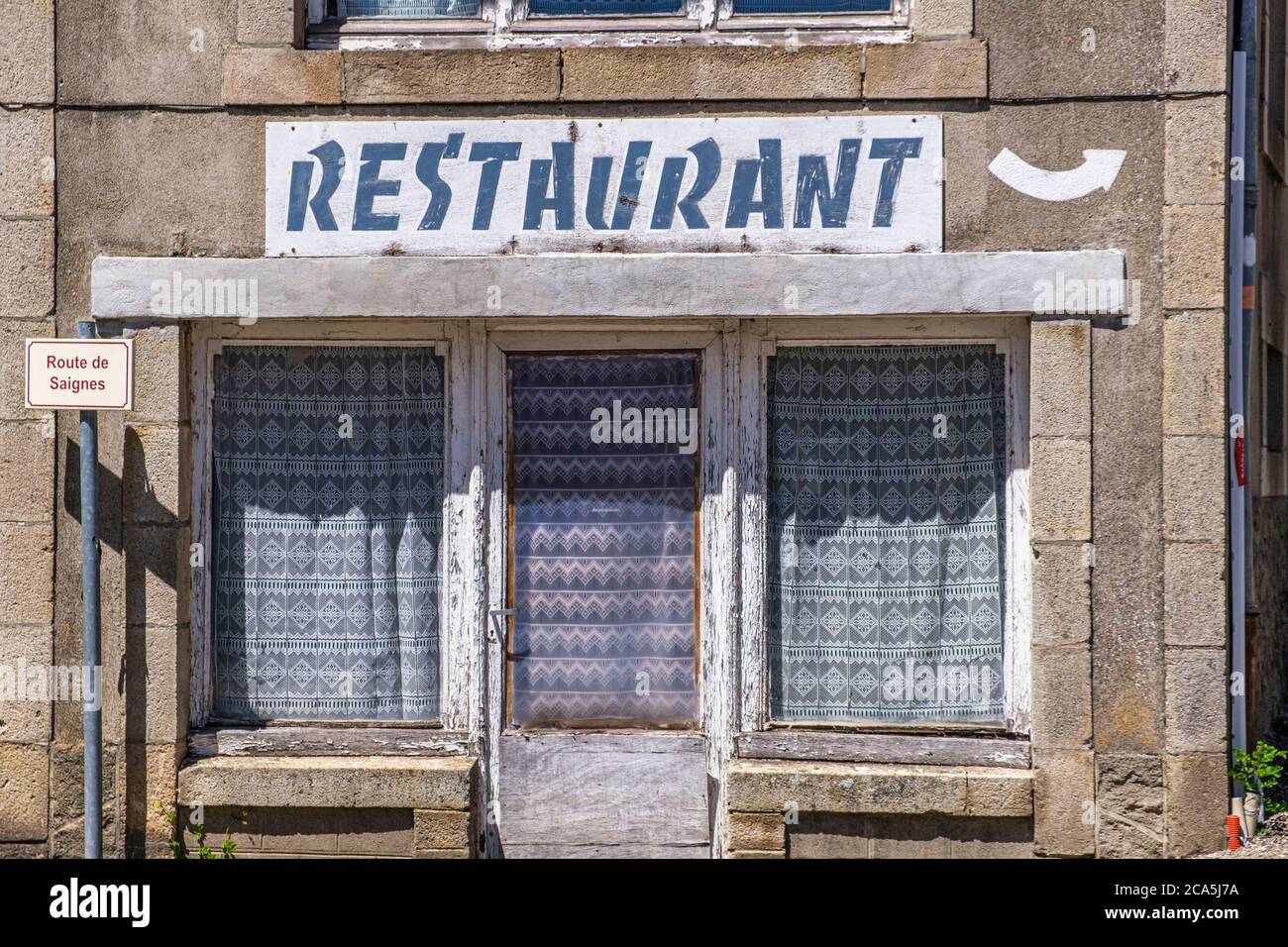 France, Cantal, bar facade in the village of Trizac, regional natural ...