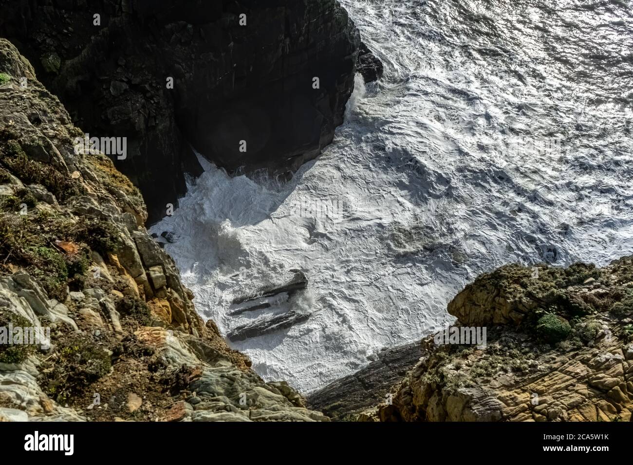 Foam from rough seas during storm Ciara Stock Photo - Alamy