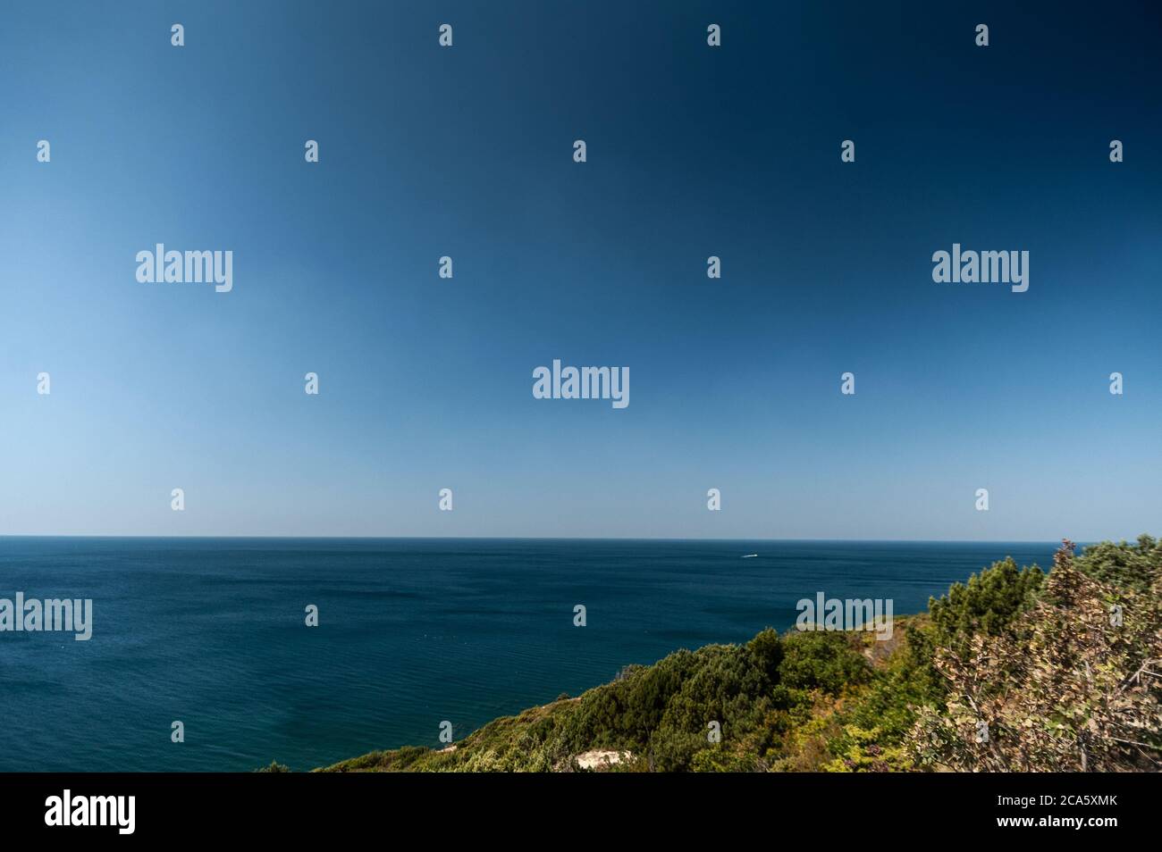 A sign above a body of water Stock Photo - Alamy