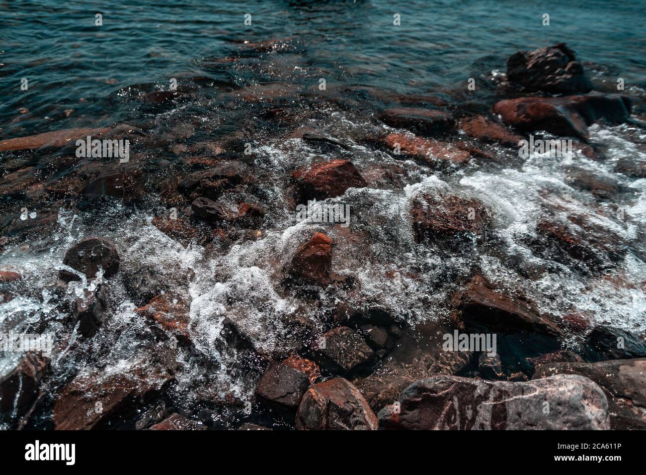 A close up of a rock near the ocean Stock Photo - Alamy