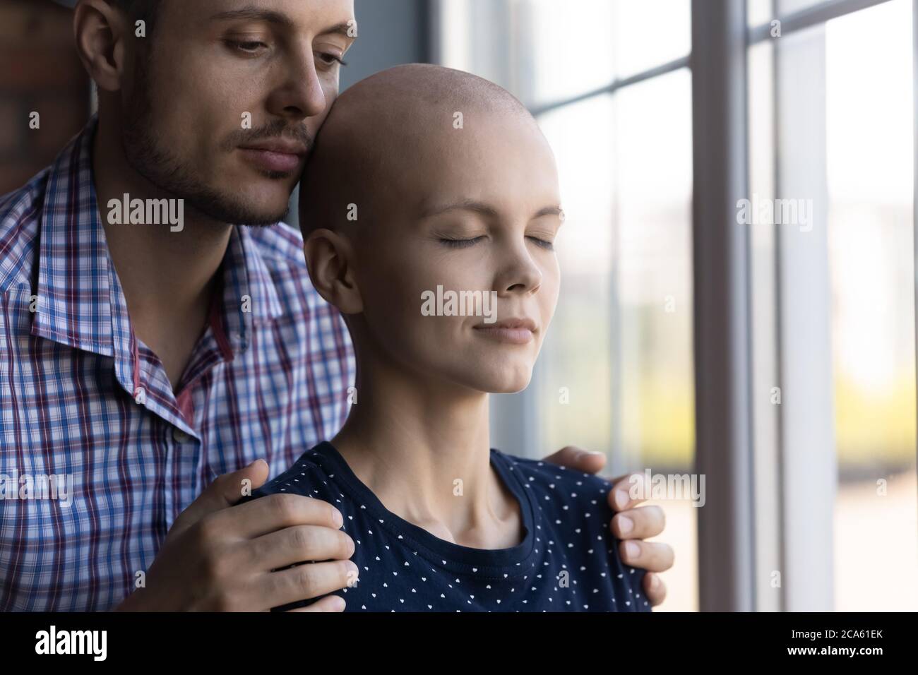 Caring husband hug support sick wife suffering from cancer Stock Photo ...