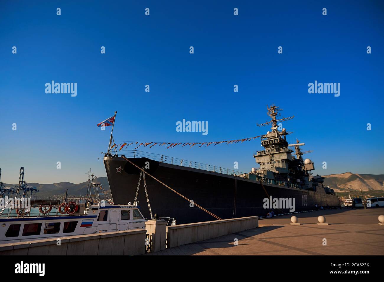 warship stands moored to shore Stock Photo - Alamy