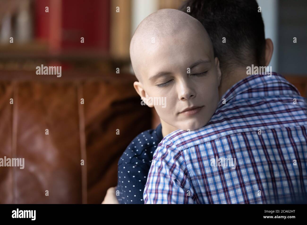 Loving husband hug comport sick suffering wife Stock Photo - Alamy