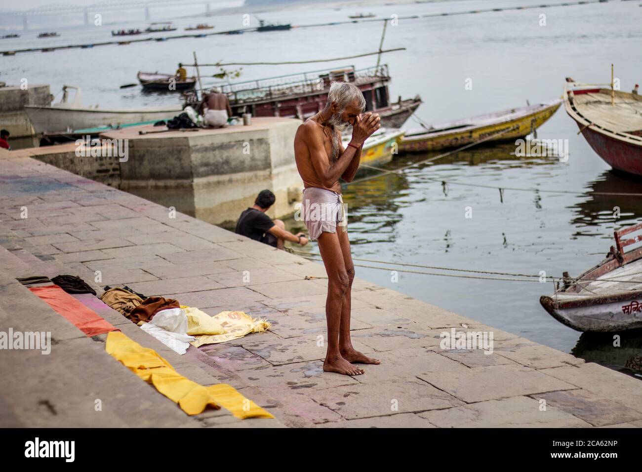 Daily activities of men in Varanasi, India Stock Photo - Alamy