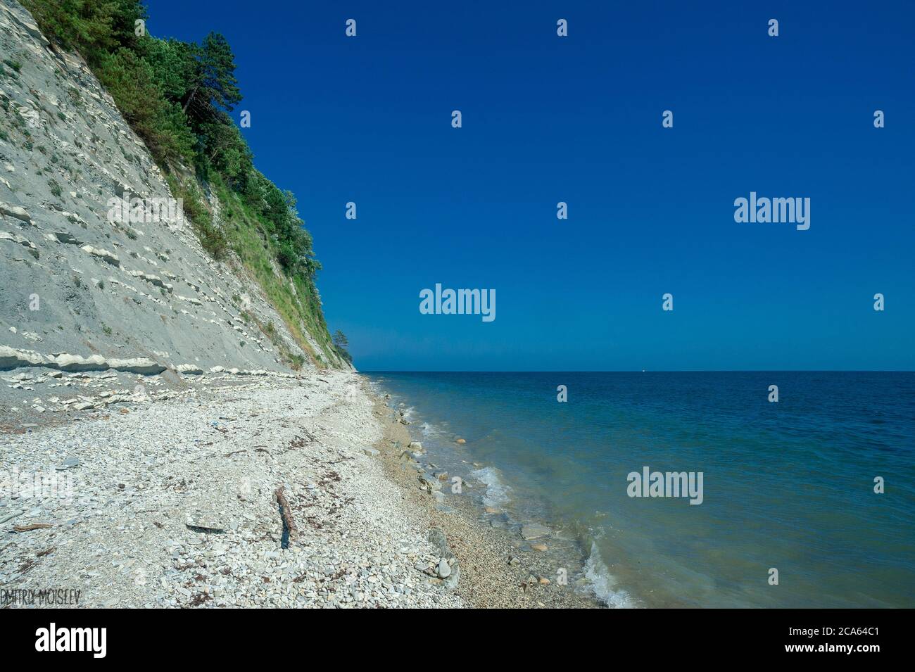 sheer rock by the sea Stock Photo - Alamy