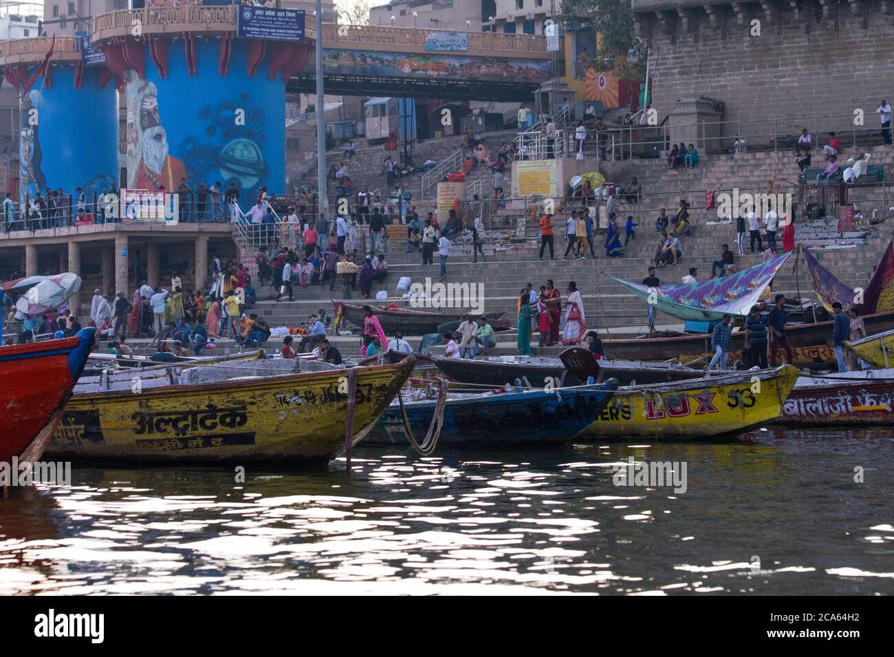 Cremation of bodies, on the burning ghat, on the banks of Ganges river ...