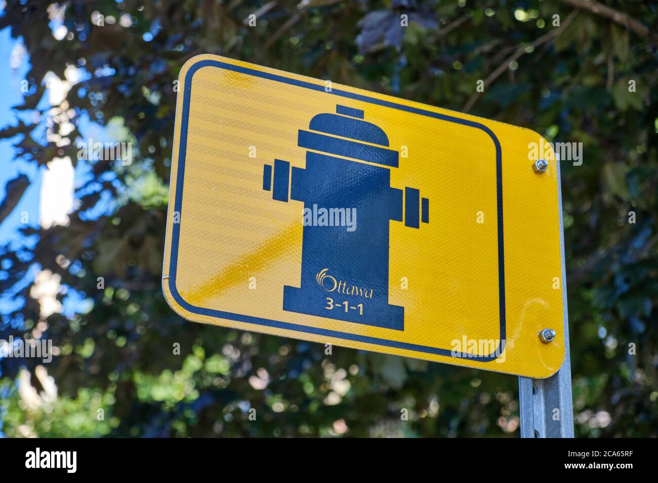 City of Ottawa fire hydrant location sign Stock Photo - Alamy