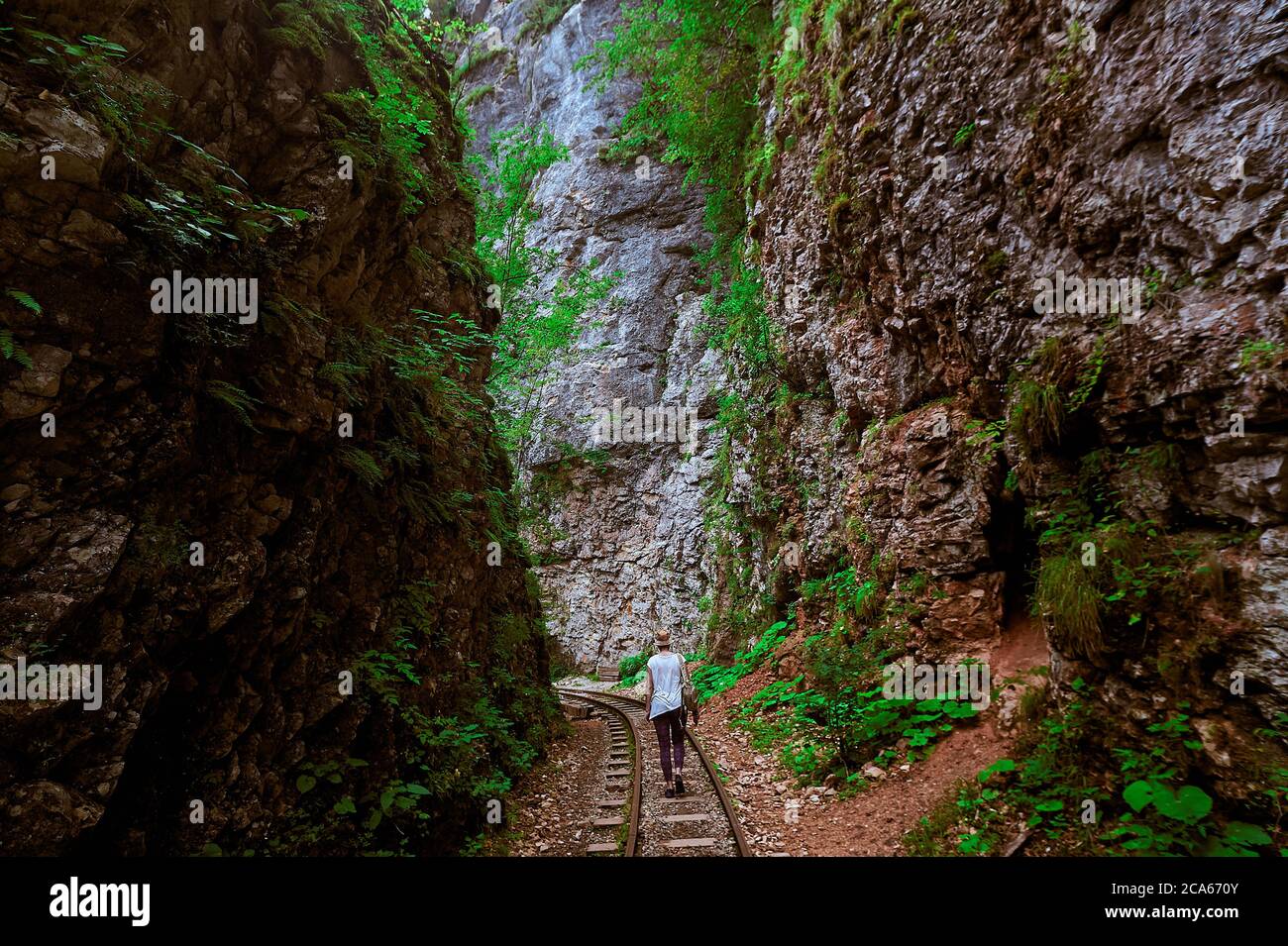 Woman next to waterfall hi-res stock photography and images - Alamy