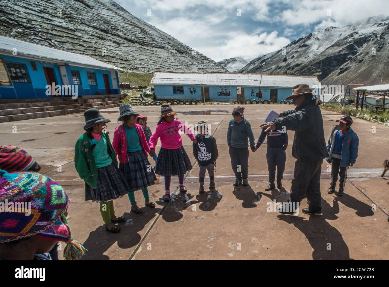 Quechua children playing outside in a small rural school in the ...