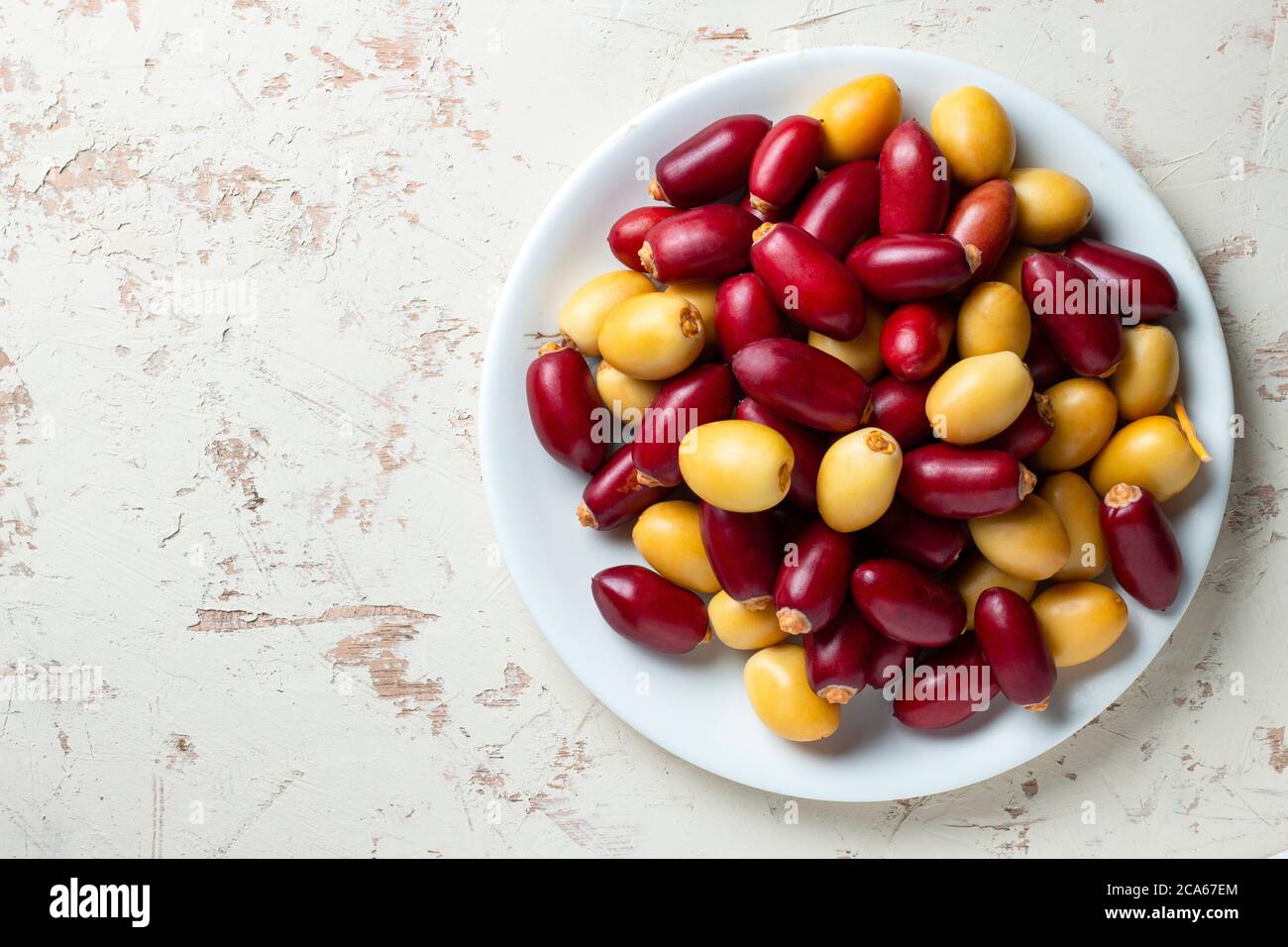 Fresh dates on plate hi-res stock photography and images - Alamy