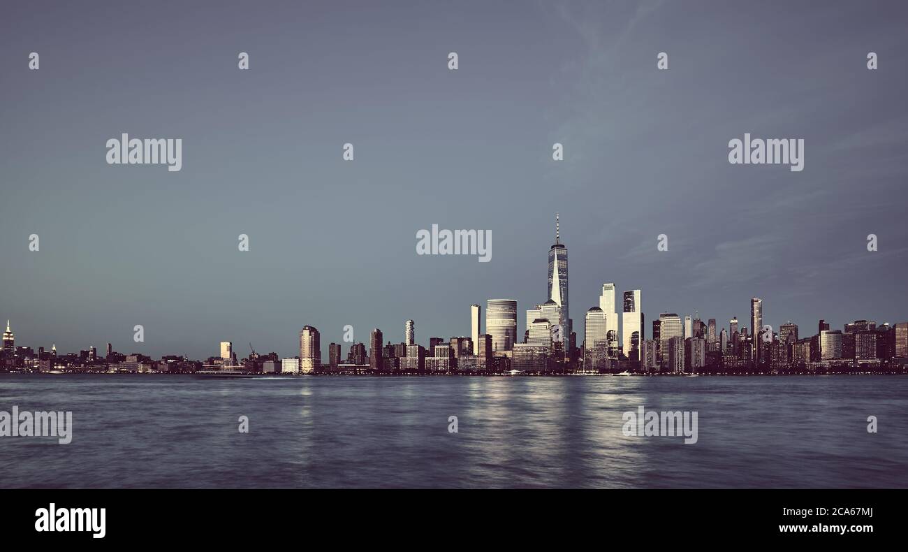 Manhattan panoramic skyline with buildings reflecting last sunlight ...