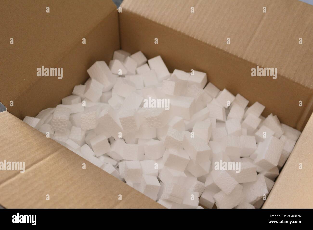 Cardboard box containing pieces of polystyrene for packaging Stock ...