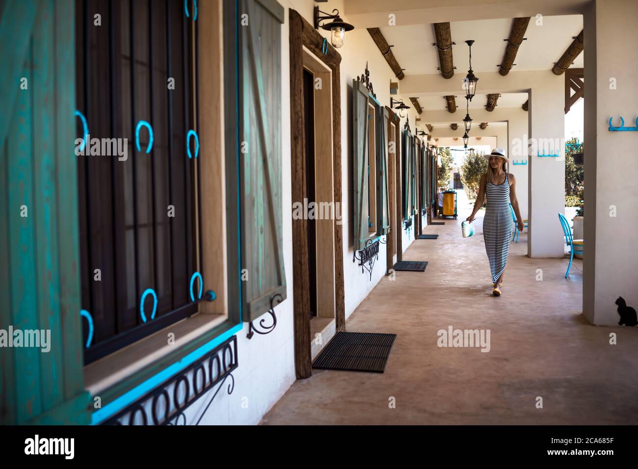 Beautiful Happy Woman Walking in Motel on Summer Vacation. Leisure Time ...