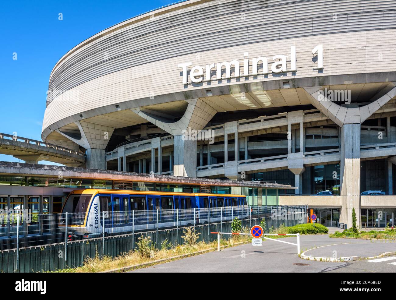 A CDGVAL airport shuttle is stationing at the station at the foot of ...