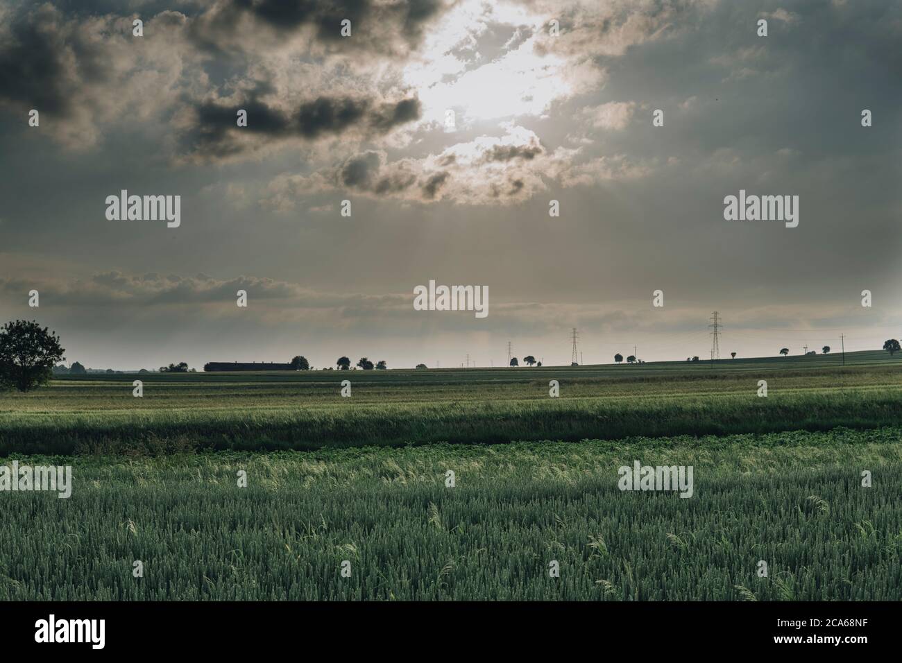 Sun covered with clouds hi-res stock photography and images - Alamy
