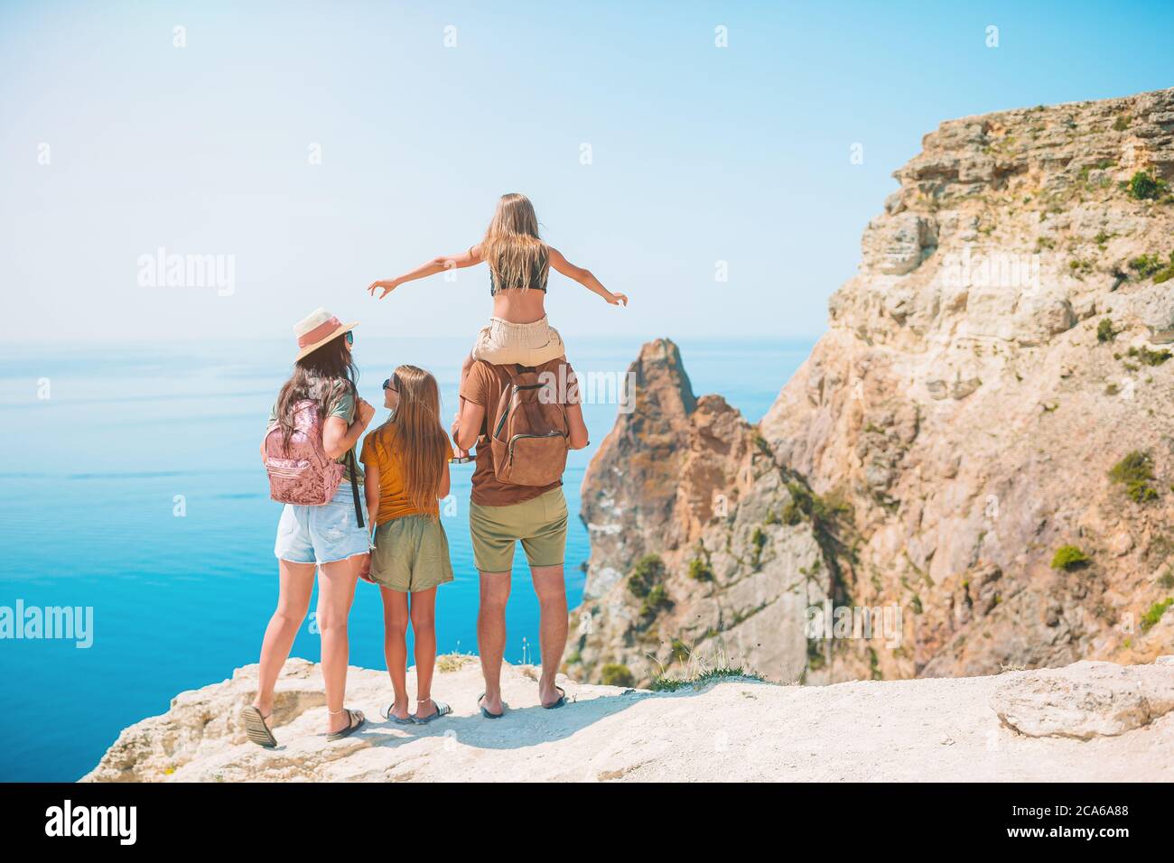 Happy family on vacation in the mountains Stock Photo - Alamy
