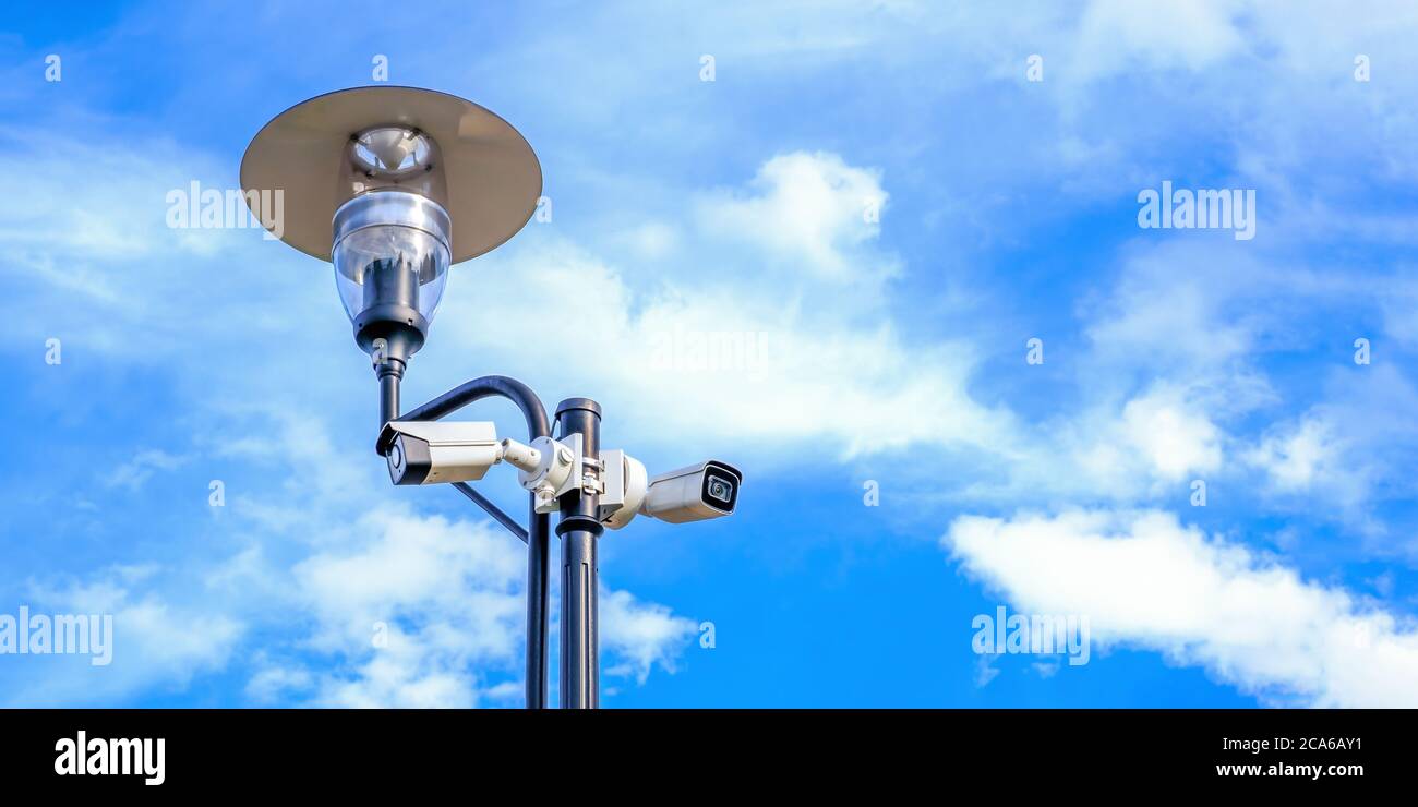 Surveillance camera on light pole hi-res stock photography and images ...