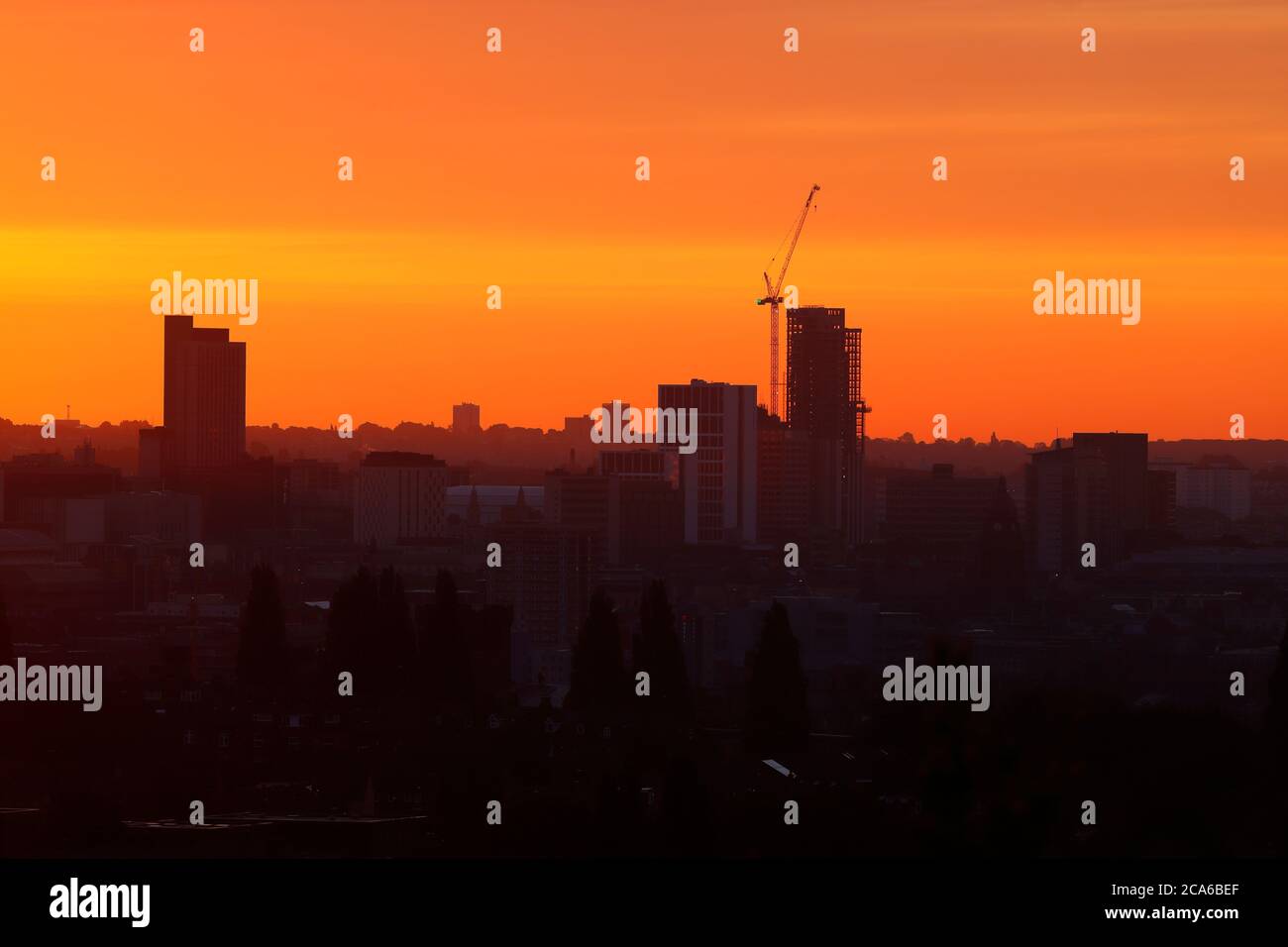 Sunrise over Leeds City Centre. The tall building to the right is Altus ...