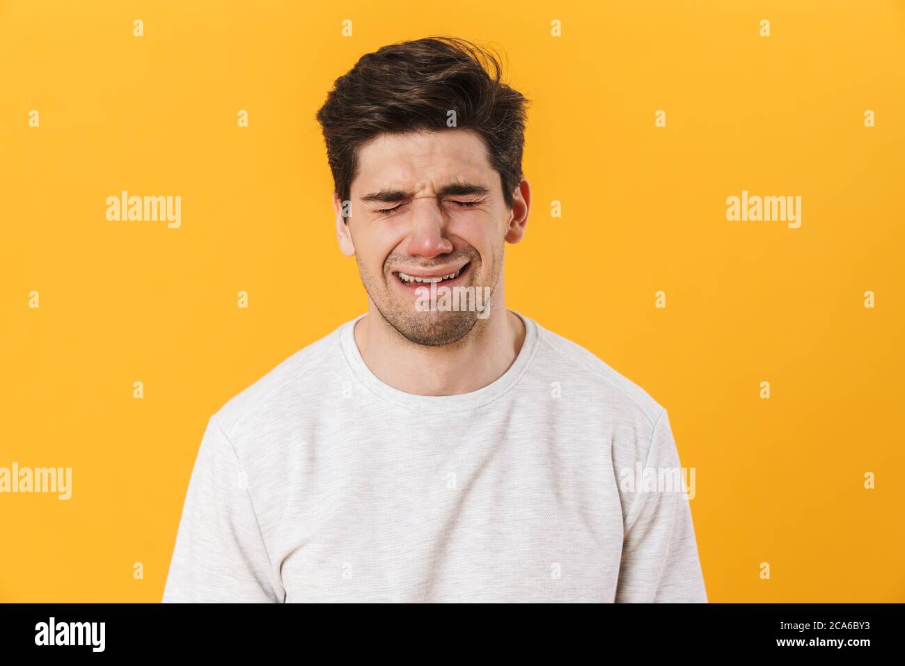 Attractive guy crying hi-res stock photography and images - Alamy