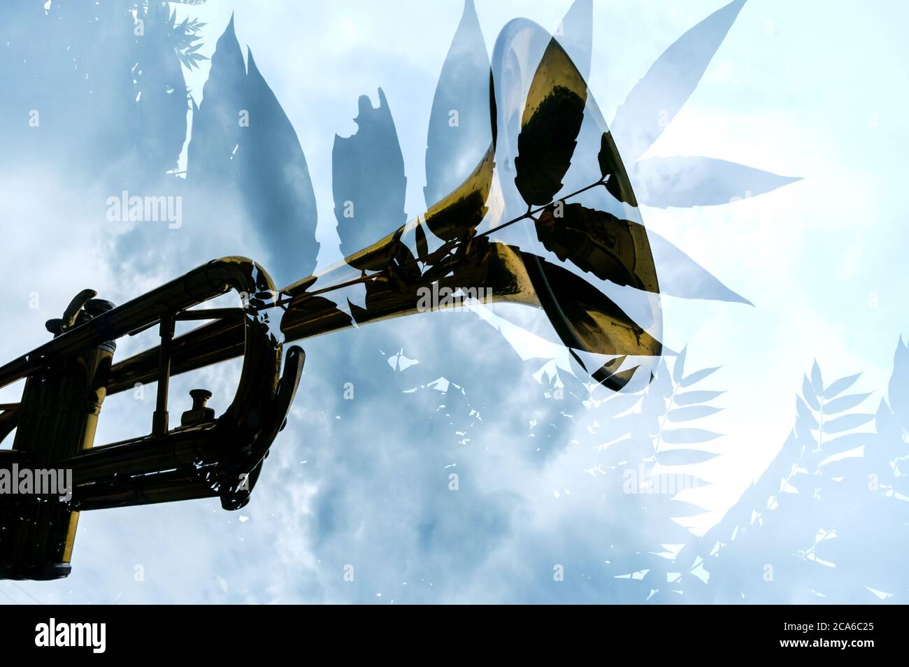 Abstract double exposure nature and old rusty musical instrument ...