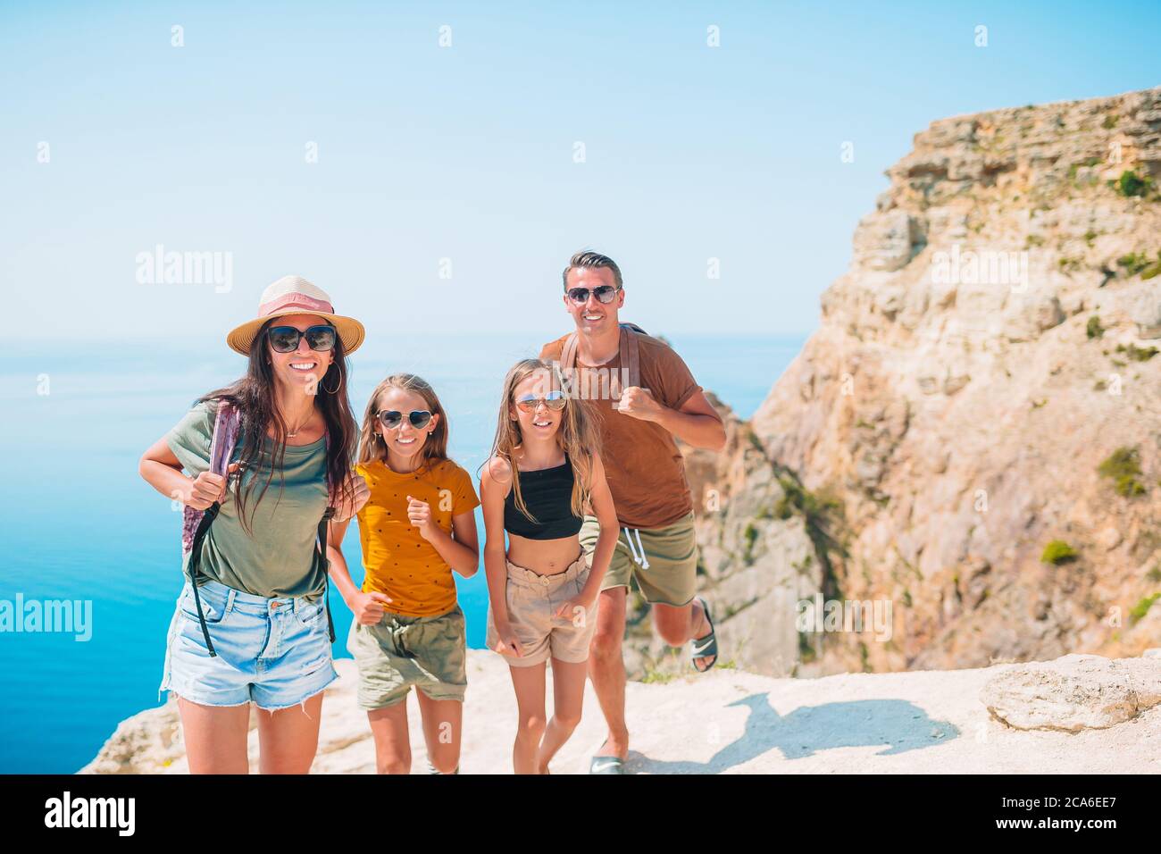 Happy family on vacation in the mountains Stock Photo - Alamy