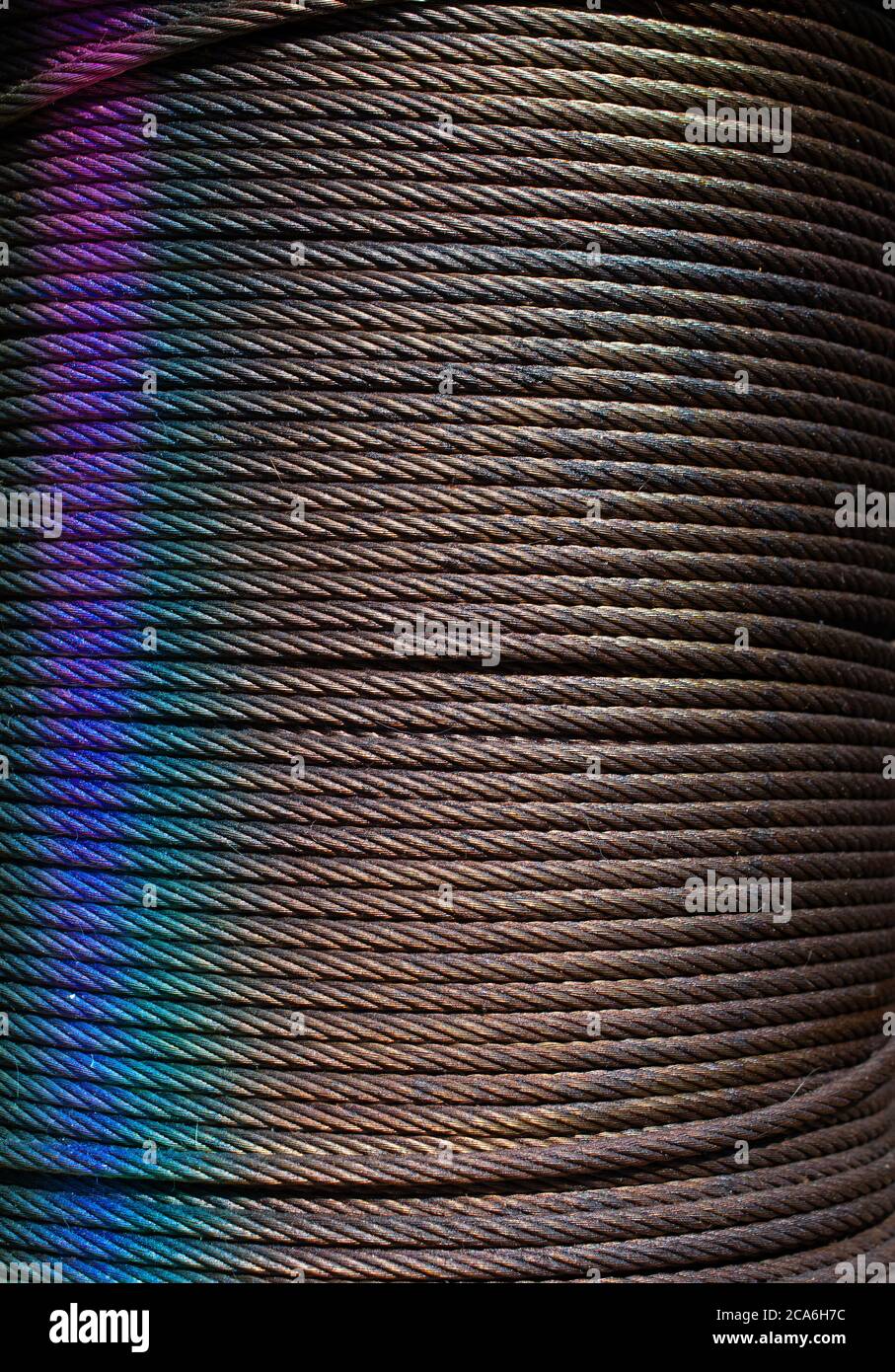 Metal wire roll close-up. Pattern of cables in view Stock Photo - Alamy
