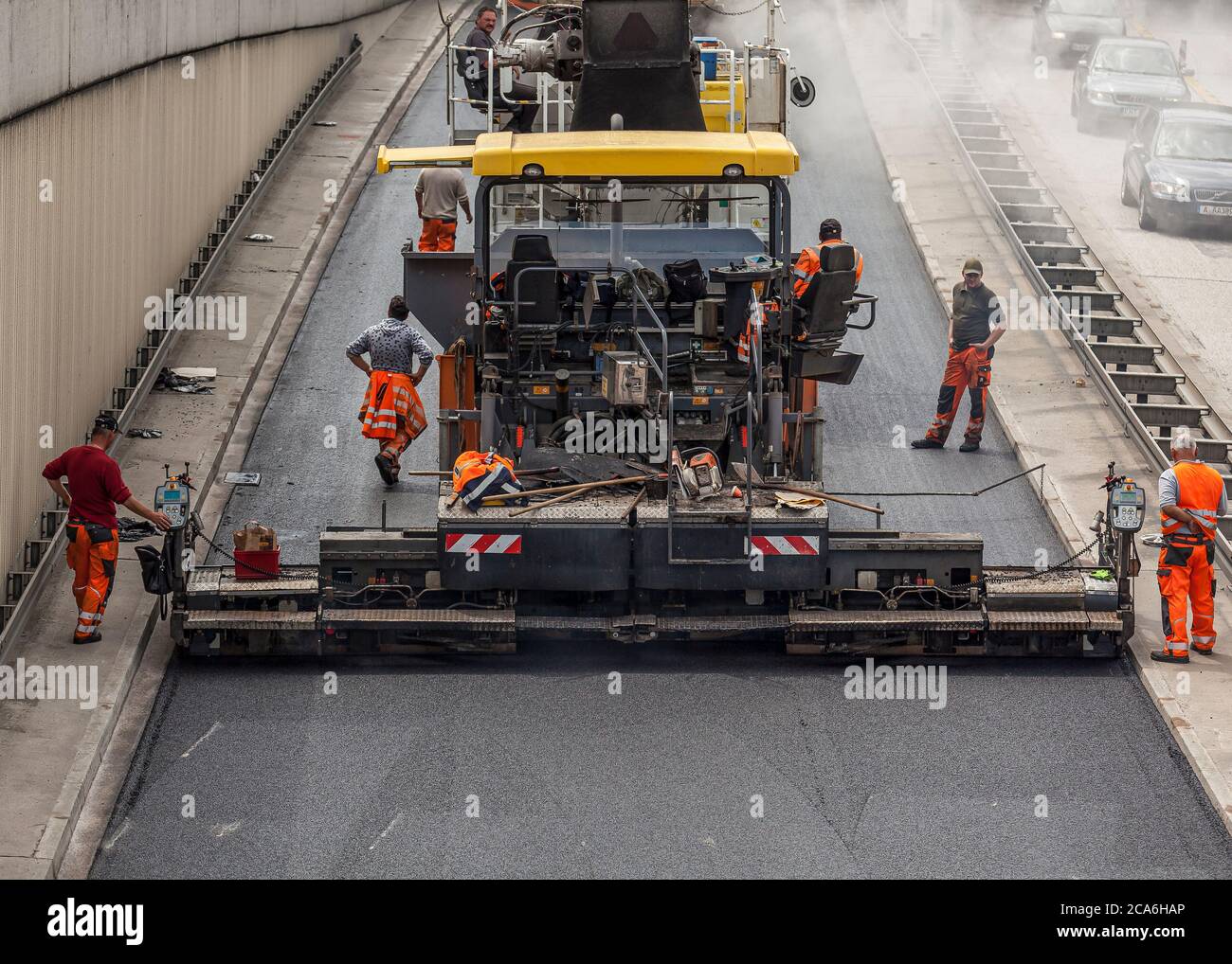 Roadworks, application of new asphalt on german highway Stock Photo - Alamy