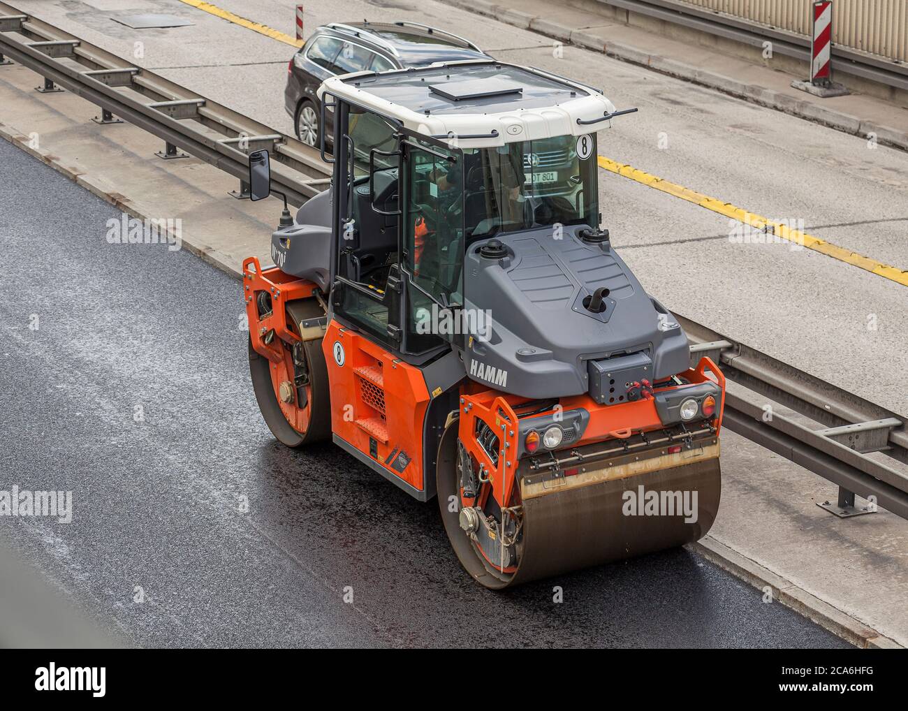 Roadworks, application of new asphalt on german highway Stock Photo - Alamy